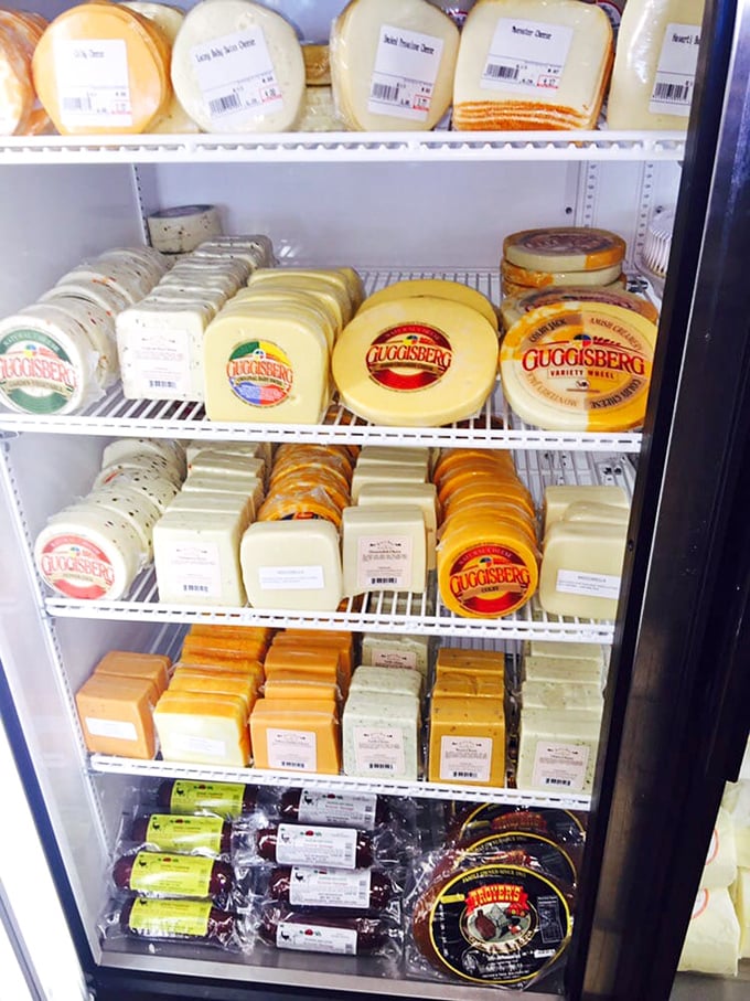 The cheese selection would make a Frenchman nod in approval—a refrigerated gallery of dairy perfection waiting to elevate your next meal.