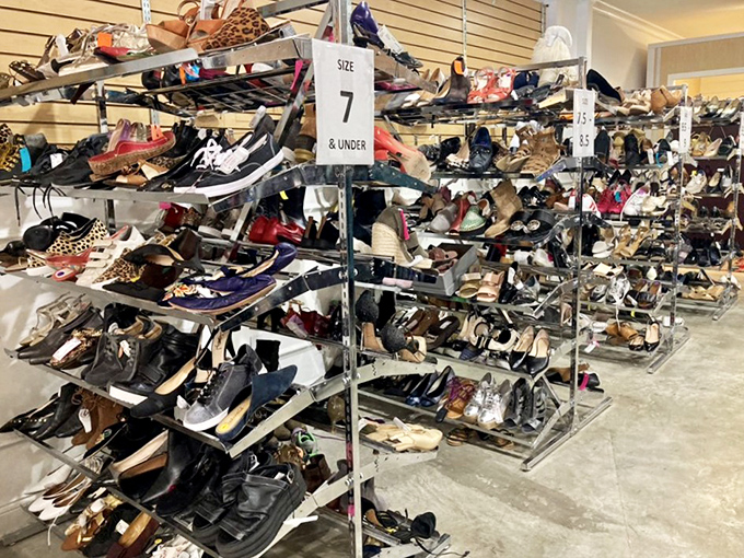 Shoe mountains organized by size create footwear adventures where Cinderella moments happen at bargain basement prices.