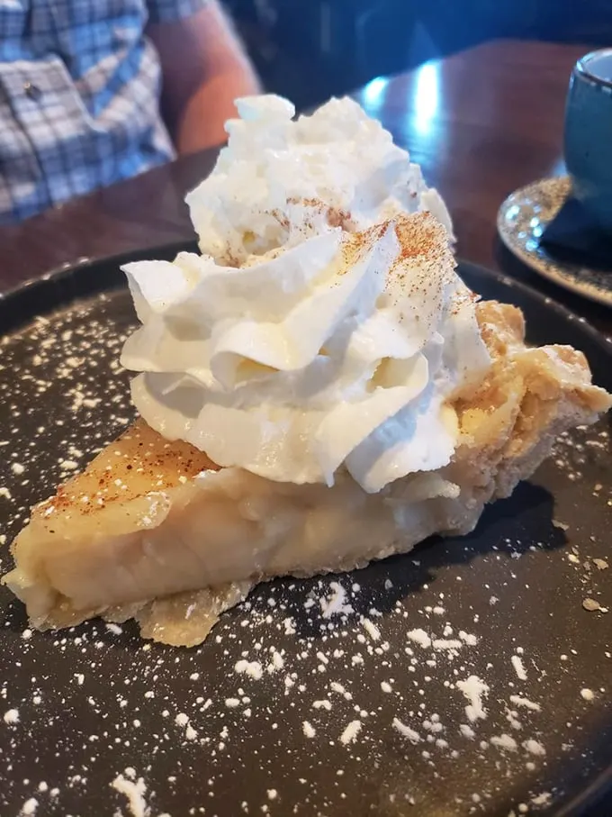 Sugar cream pie that makes you understand why it's Indiana's official state dessert. That cloud of whipped cream is just showing off at this point.