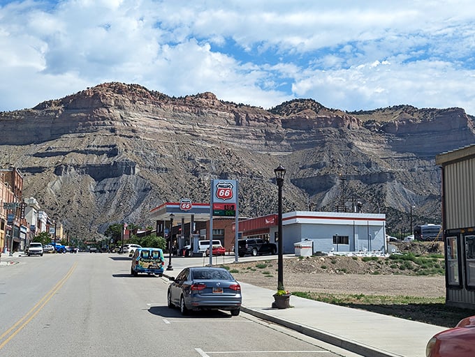 Main Street Helper, where the Phillips 66 sign isn't retro-chic by design but simply never left, and the mountains stand guard like protective giants.