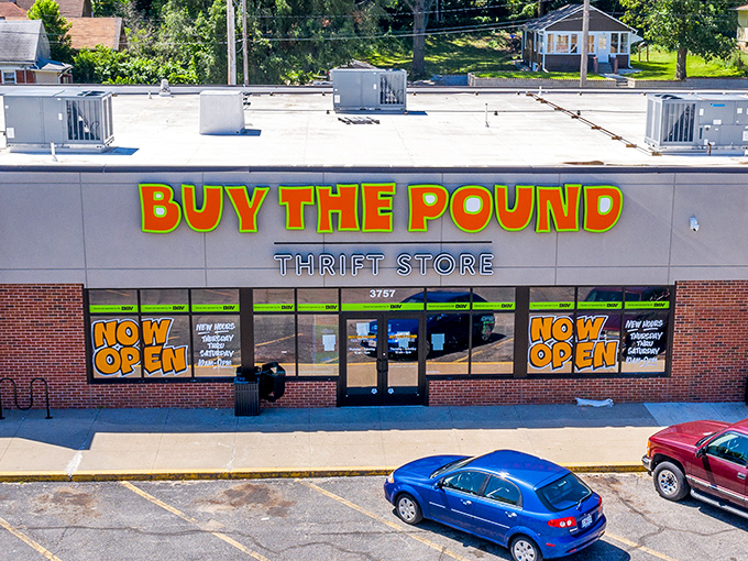 "Buy The Pound" announces itself with carnival-bright letters. This isn't shopping—it's a weigh-and-pay adventure!