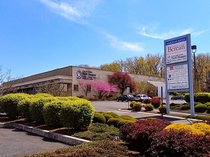 Care & Share's professional signage belies the treasure hunt within. This isn't just shopping—it's an expedition!
