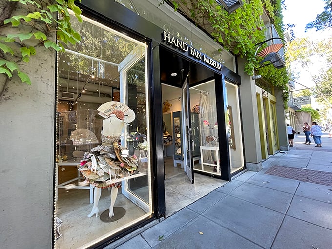 The Hand Fan Museum's elegant storefront displays fashion accessories that cooled generations before air conditioning stole their thunder.