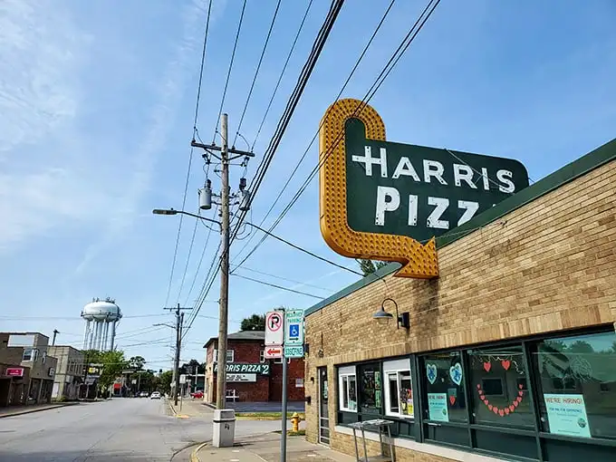 That vintage Harris sign has been directing pizza lovers to malty, scissor-cut heaven since before most of us were born.