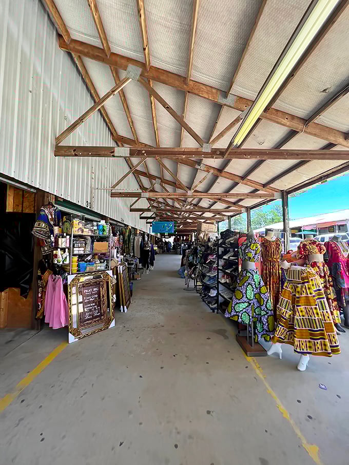 Under this humble metal roof, vendors create narrow canyons of potential treasures—like a small city where everything happens to be for sale.
