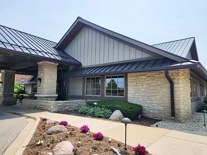 Don't let the shopping center location fool you – behind that stone facade lies a steakhouse experience worth the drive.
