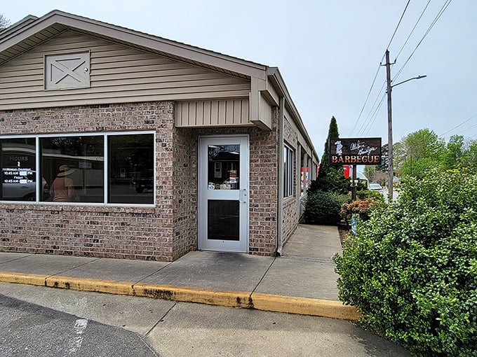 Alston Bridges Barbecue's unassuming exterior hides smoky treasures within—proof that in North Carolina, the humblest buildings often house the greatest flavors.