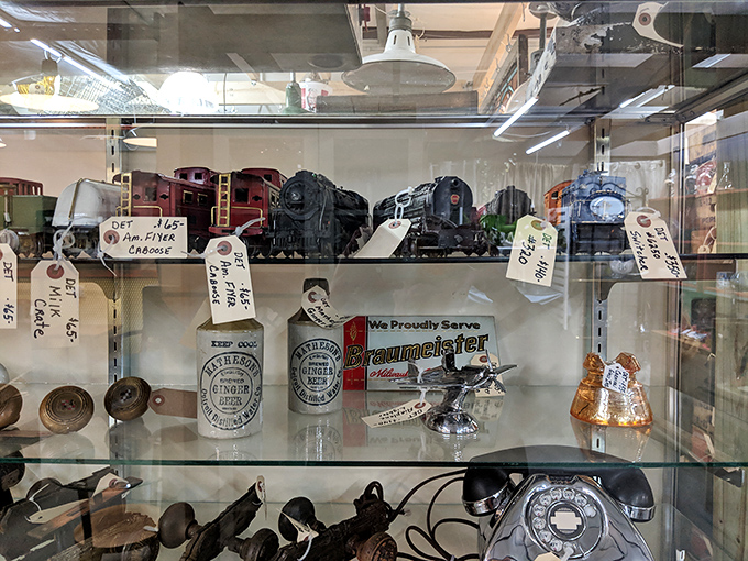 Model trains and vintage telephones—the analog entertainment center before Netflix asked if you were still watching.