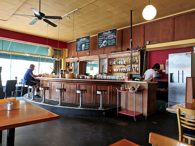 The bar – where coffee transforms into courage in the morning, and craft beers soothe the day's battle scars by evening.