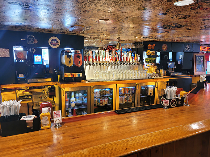 Behind this bar, magic happens. Colorado craft beers flow freely beneath a ceiling that bears witness to decades of good times.