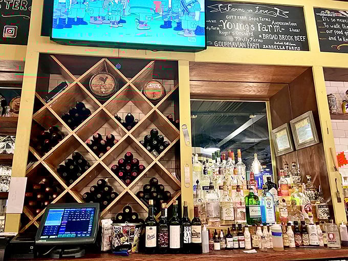 The bar's wooden wine rack isn't just storage—it's a promise of good times ahead. Decisions, decisions.
