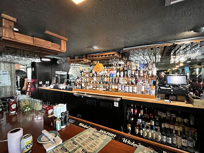 A well-stocked bar that says, "Yes, we take the 'Booze' part of our name as seriously as the 'Red' and 'White' parts."