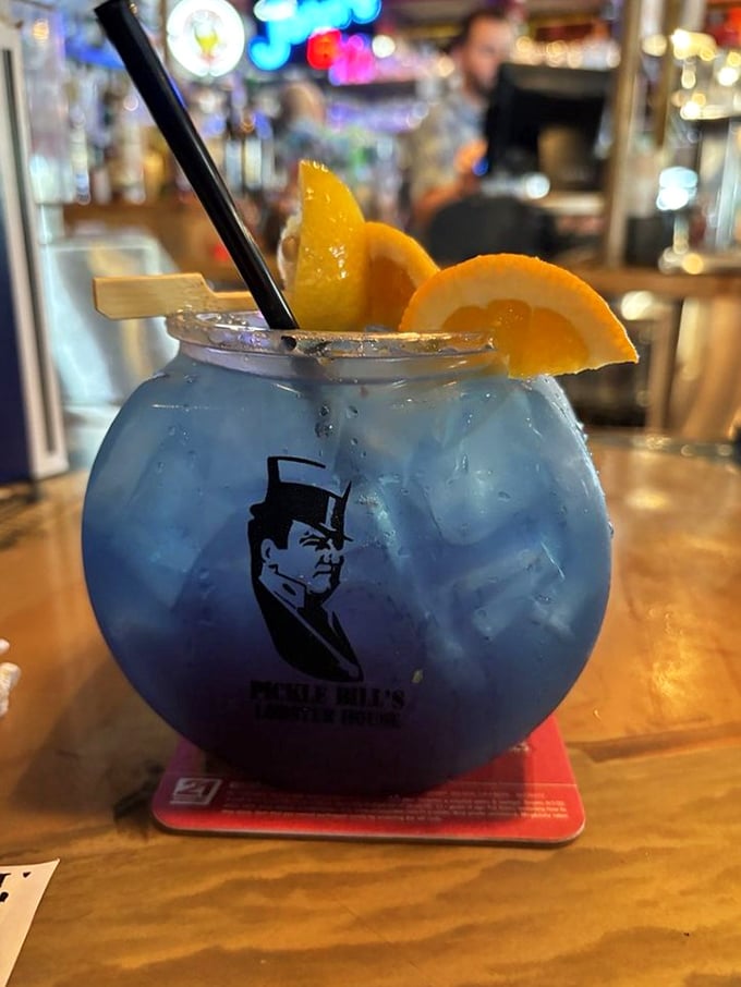 This blue lagoon cocktail isn't just a drink—it's a vacation in a glass with Pickle Bill himself keeping watch.