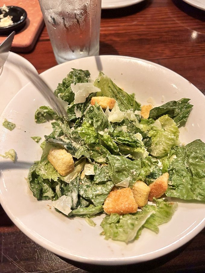 Even the Caesar salad gets respect here—crisp romaine, shaved parmesan, and house-made croutons that weren't born in a bag. A nod to those seeking green.