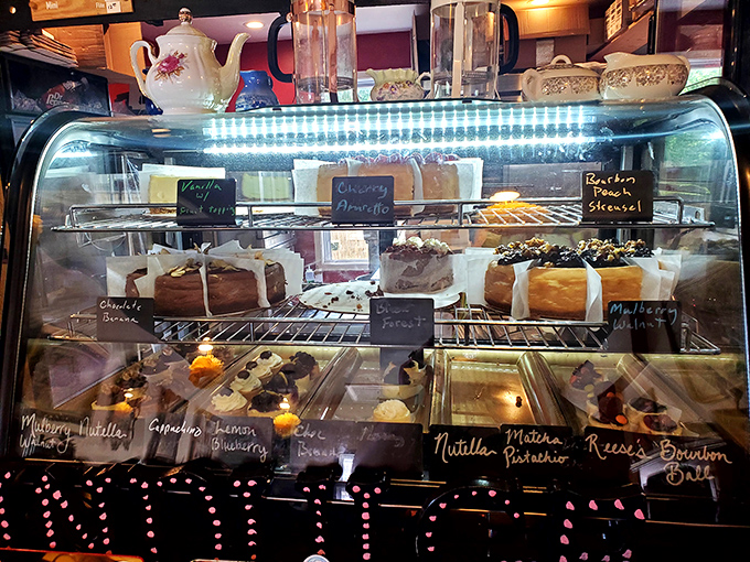 The dessert case that launches a thousand diets—and then promptly ends them. Each little chalkboard sign is basically a permission slip to indulge.