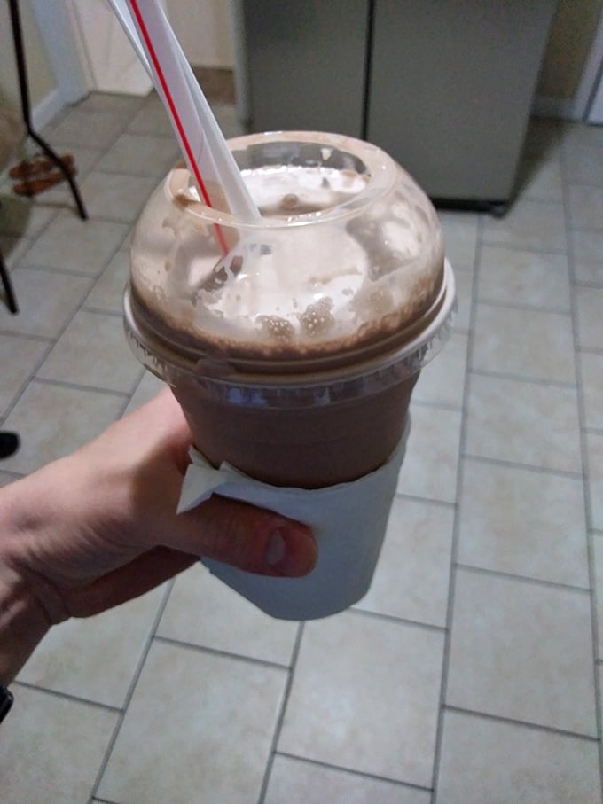 This chocolate shake isn't just a drink—it's a commitment. The dome lid is actually there to contain all that happiness.