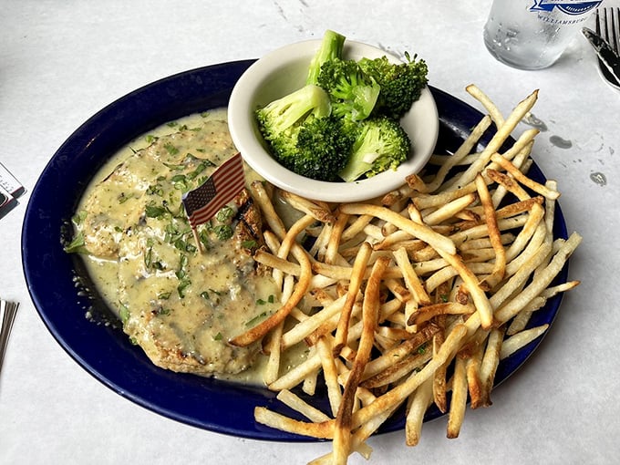 Chicken bathed in a creamy herb sauce that makes you want to write poetry. Those hand-cut fries aren't just sides—they're supporting actors worthy of their own spotlight.