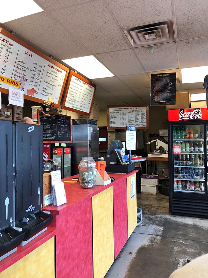 The counter where dreams come true and diets go to die. Notice the soda machine standing ready to wash down all that smoky goodness.