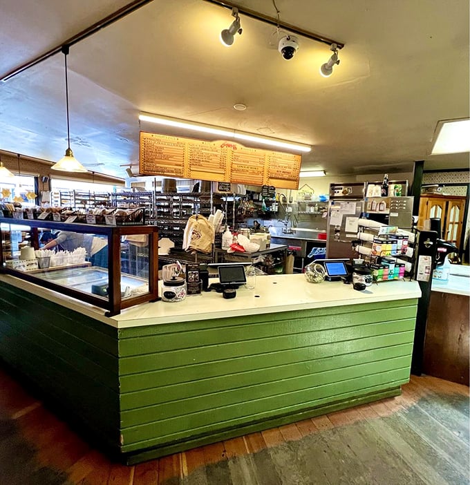 The green counter stands like mission control for pie operations. From here, dreams are dispatched one slice at a time.