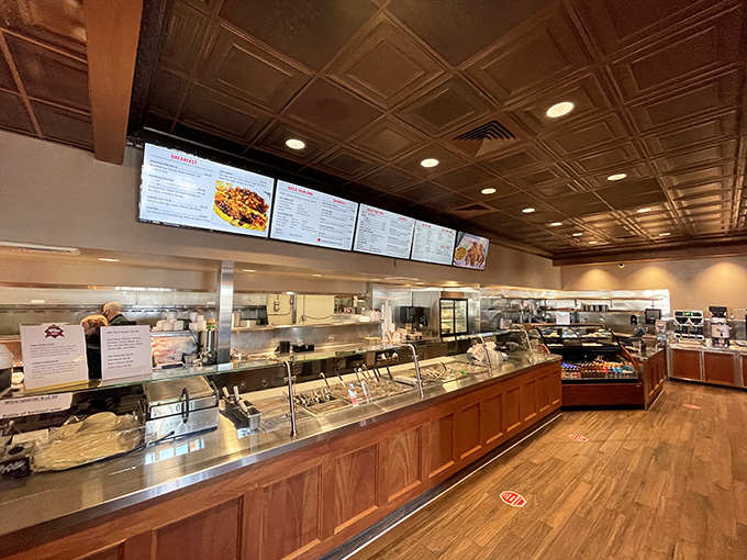 The serving line isn't just efficient – it's a testament to the art of feeding hungry travelers quickly without sacrificing an ounce of quality.