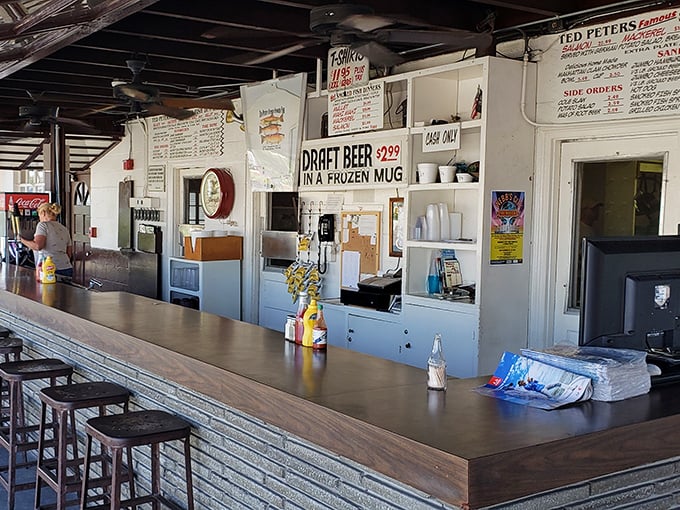 The counter where magic happens. No fancy digital displays or buzzers—just good people serving great food with the efficiency of a well-rehearsed orchestra.