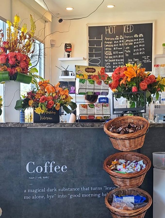 Flowers and coffee create the perfect marriage at this counter, where even the baskets seem to be arranged with mathematical precision.
