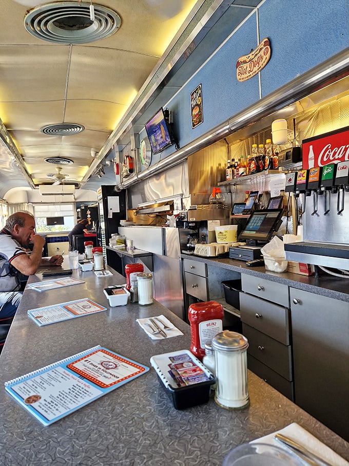 The beating heart of diner magic – a counter where coffee flows freely, orders fly to the kitchen, and friendly banter is always on the menu.