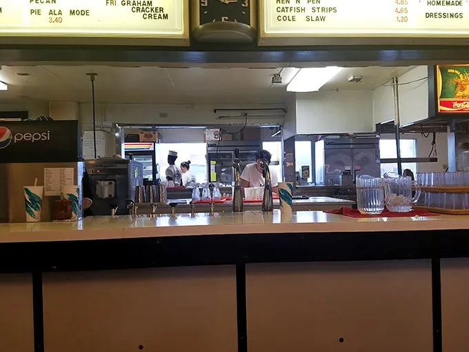 Behind this counter, the magic happens with methodical precision – no fancy equipment, just decades of know-how.