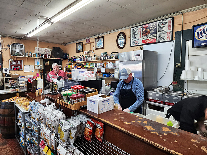 Behind this counter, sandwich artists create edible masterpieces. No fancy chef's whites needed—just decades of know-how.
