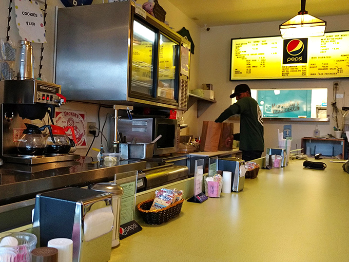 Behind this counter, barbecue magic happens without fanfare. No smoke and mirrors—well, maybe some smoke, but that's essential.