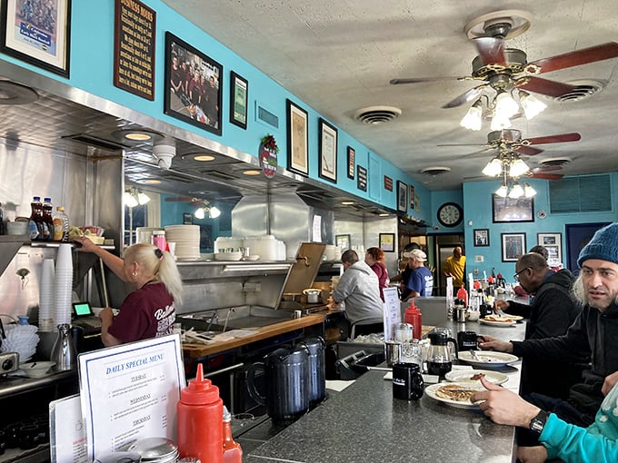 Blue walls, ceiling fans, and hungry patrons at the counter—the breakfast ballet performed daily at this Baltimore institution.