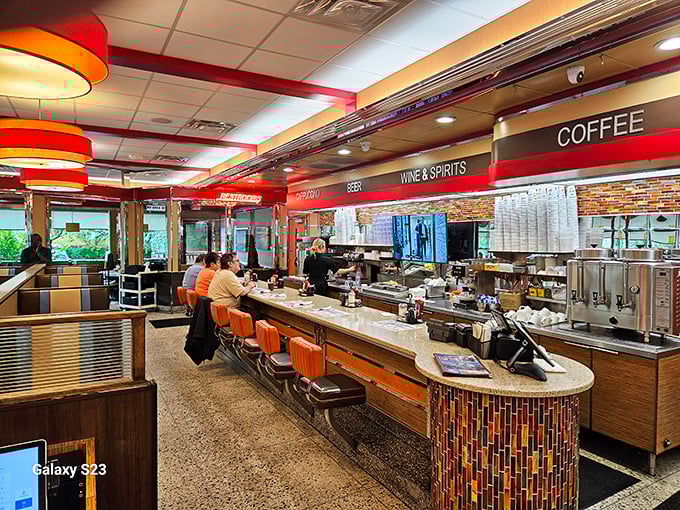 The counter seats offer front-row tickets to the culinary ballet of short-order cooks who've elevated efficiency to an art form.