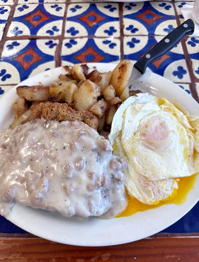 Country fried steak with gravy and eggs – when your day ahead requires serious fortification and your arteries have agreed to look the other way.