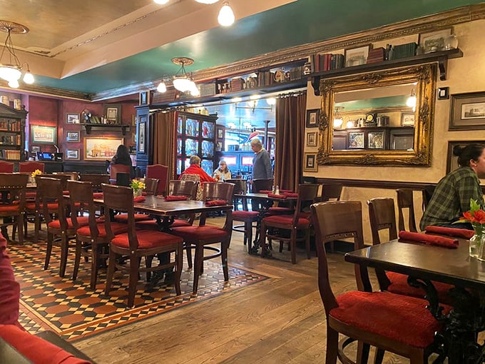 Red walls, wooden tables, and enough Irish memorabilia to make you check your passport—the dining room where conversations flow as freely as the Guinness.