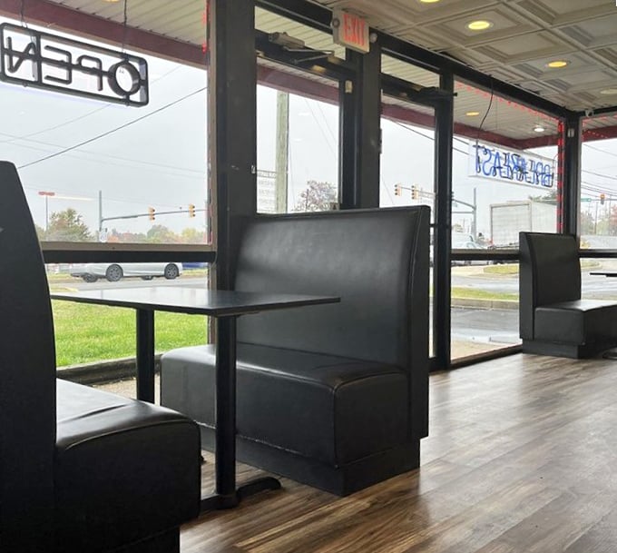 Simple booths against large windows where the only view that matters is the one on your plate—comfort food in a comfort zone.