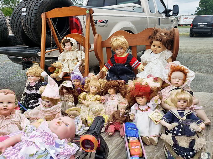 Childhood nostalgia arranged in neat rows—each doll's vacant stare somehow both innocent and slightly unnerving in the Pennsylvania sunshine.