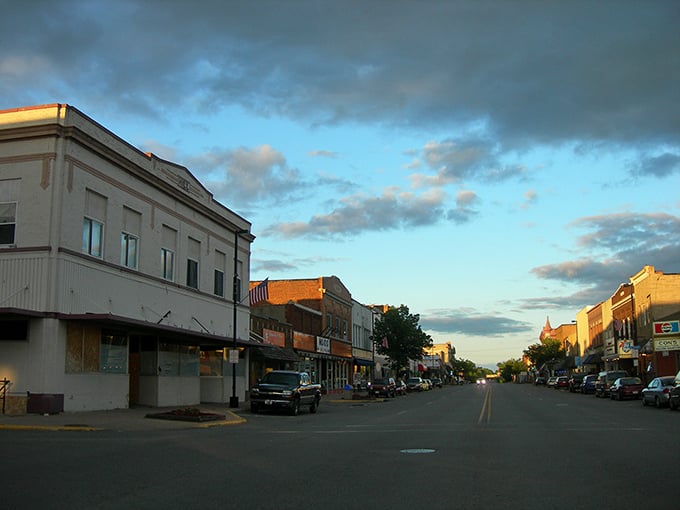 Downtown Antigo at dusk glows with possibility – when small-town storefronts look their most cinematic and tomorrow's adventures are just hours away.