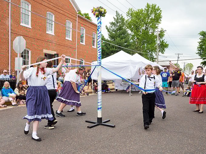 Traditional maypole dancing—where coordination meets celebration and spectators get to enjoy both the cultural display and occasional entertaining missteps. German heritage in motion!