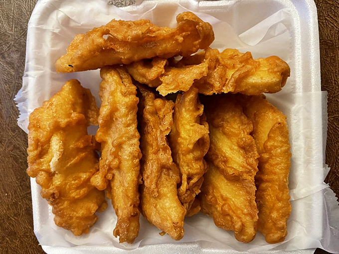 Behold the star of the show—a fish fillet that's traveled through time unchanged, maintaining its crispy perfection while restaurant empires have risen and fallen around it.