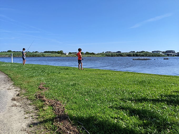 Fishing poles, patience, and possibilities. These young anglers are learning life's most valuable lesson—sometimes the best catch is the memory.