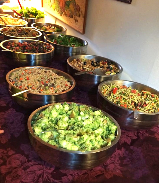 The Sunday buffet spread—a vegetarian feast that proves abundance doesn't require animal products, just imagination and skill.