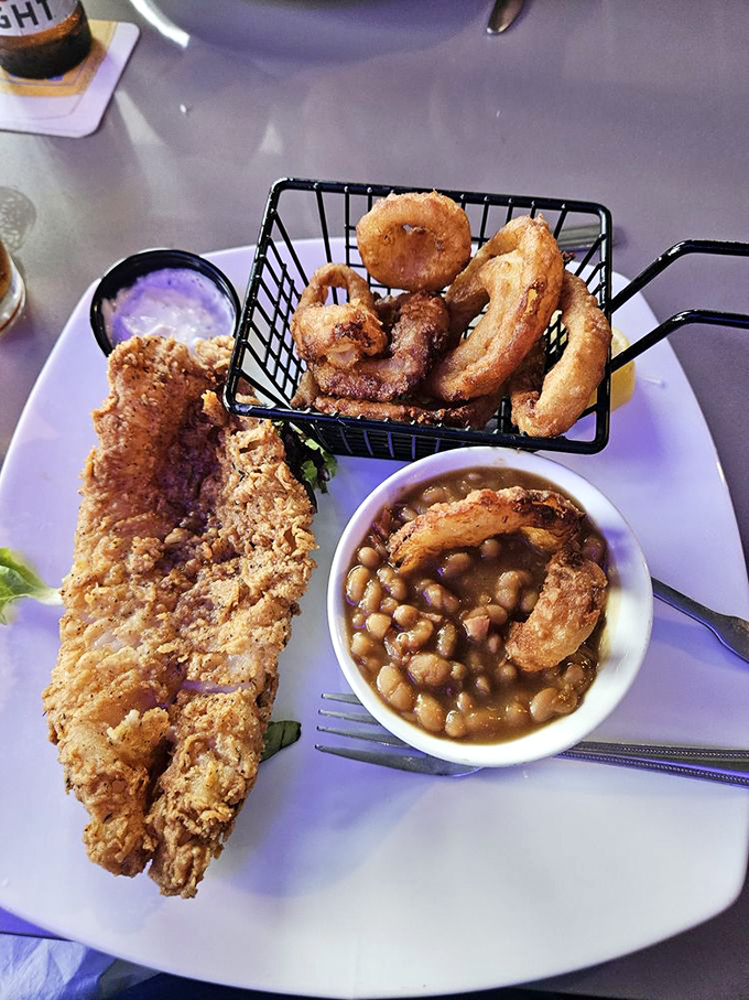 Fried grouper that achieves the impossible: a crispy exterior giving way to flaky perfection, with zero guilt about the calorie count.