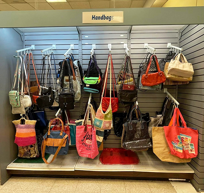 The handbag section offers a colorful array of purses, totes, and shoulder bags. That crocheted rainbow tote is practically screaming "summer farmers market."