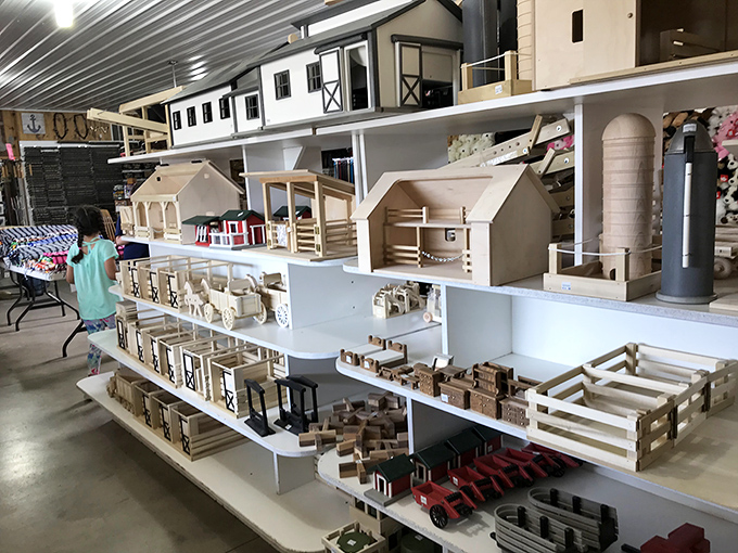 Miniature barns, tiny tractors, and dollhouse-sized furniture showcase the craftsmanship that makes Amish Country famous—childhood nostalgia meets adult appreciation for quality.