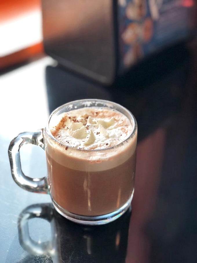 Hot cocoa that doesn't just warm your hands but restores your faith in humanity, topped with a cloud of whipped cream.