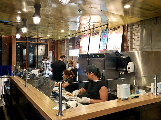 Where the magic happens—Centro's open kitchen lets you witness the choreography of cooks transforming simple ingredients into flavor bombs.