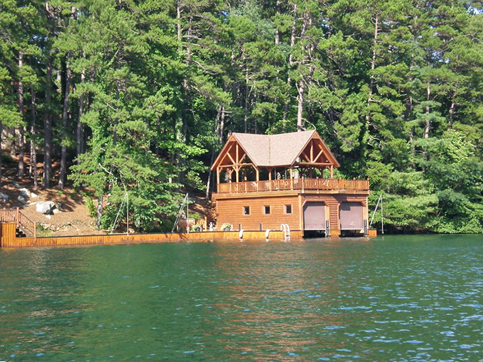 Lake Burton's crystal waters host charming boathouses that make you wonder if you should quit your job and become a lake person.