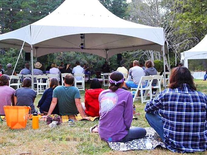 Under canvas tents and open skies, islanders gather for the simple pleasure of live music—proof that entertainment needs no elaborate venue when the setting is this good.