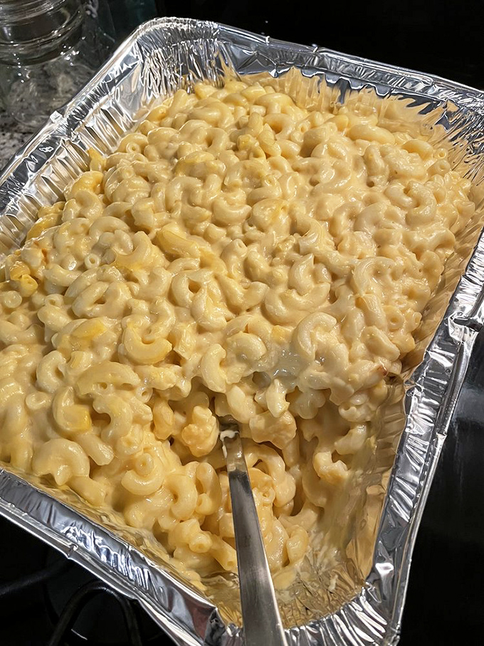 Mac and cheese that's achieved its final, perfect form. This isn't side dish territory anymore—this is the main event masquerading as a supporting player.