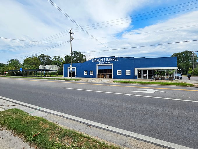 Marlin & Barrel Distillery's bold blue exterior hints at the spirited adventures waiting inside – no prescription needed for this kind of blue therapy.